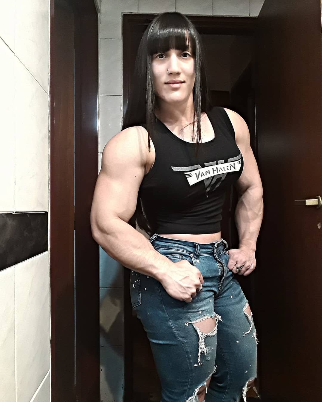 Muscle girls in tight jeans and t-shirts